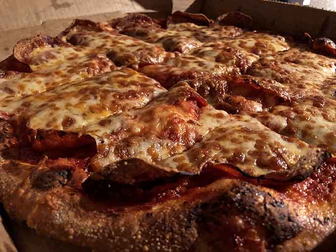 That golden-brown crust and generous cheese coverage demonstrate why simple pepperoni pizza remains an eternal champion.