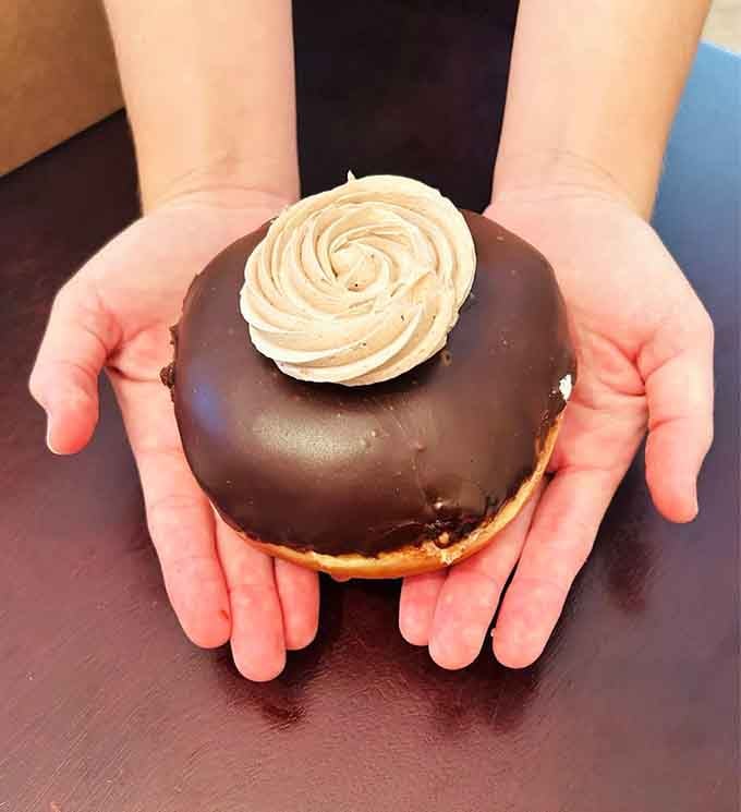 Chocolate-covered perfection topped with a swirl that looks almost too pretty to eat. Almost being the key word.