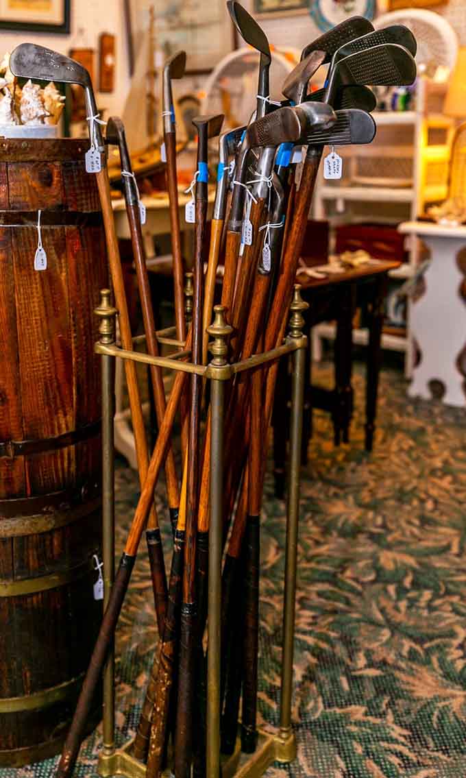 Vintage golf clubs stand ready like they're waiting for Arnold Palmer to walk through and reclaim his old equipment.