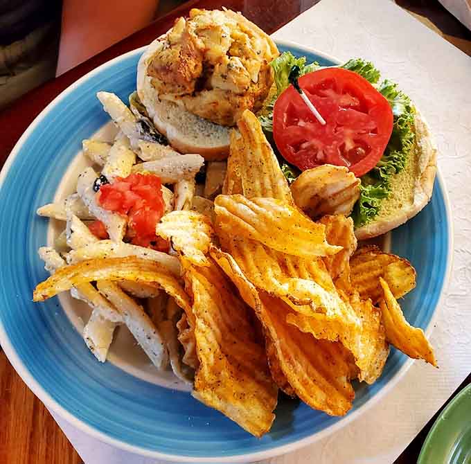 That crab cake sandwich sits pretty on its bun like it knows exactly how good it tastes.