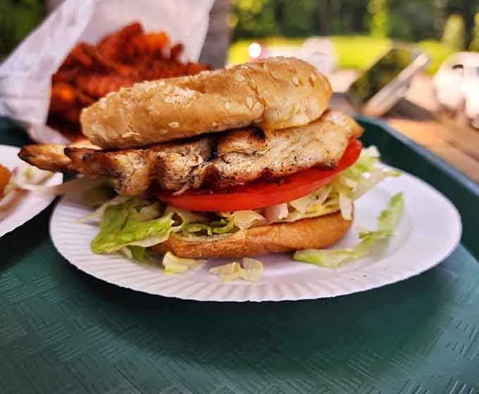 This grilled chicken sandwich sits on that bun like it owns the place, and honestly, it does.