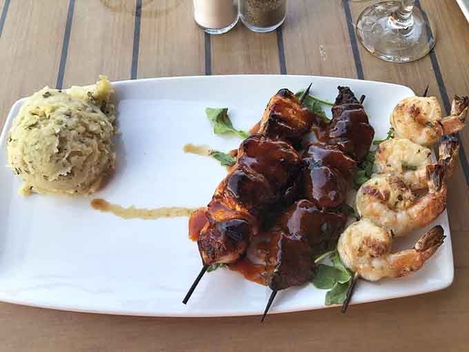 The mixed grill delivers surf and turf harmony that would make even the pickiest eater reconsider their life choices.