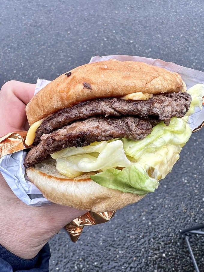 Two patties are better than one, especially when they're sandwiched between melted cheese and crisp lettuce like this.