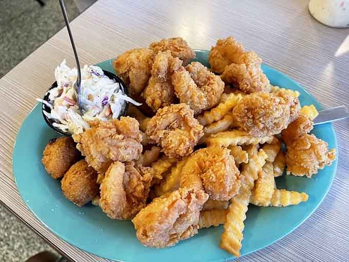 This mountain of fried seafood and crinkle-cut fries isn't messing around with portion sizes or your willpower.