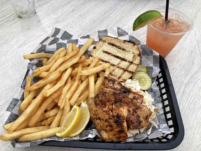 Grilled rockfish with a mountain of fries, because portion control is for people without waterfront views.