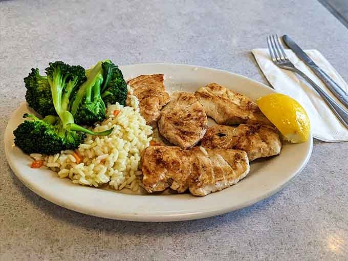 Perfectly grilled swordfish with rice and broccoli, because sometimes simple preparations let quality ingredients shine brightest.