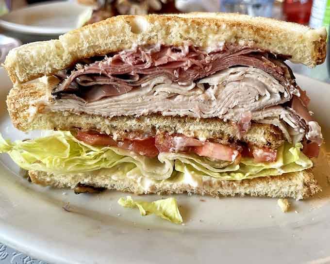 That triple-decker sandwich is stacked higher than your cholesterol will be after eating it, but it's absolutely worth the risk.