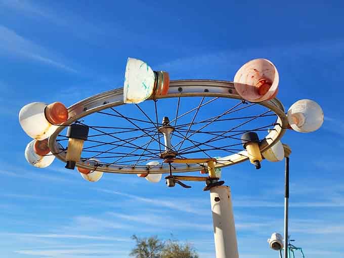 A bicycle wheel reimagined as celestial art, spinning the mundane into something unexpectedly magical and whimsical.