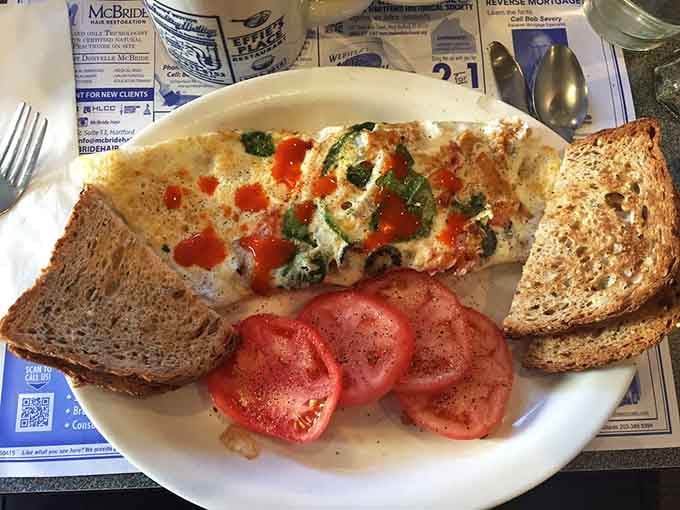The Greek Omelet proves that Mediterranean flavors and American breakfast traditions can absolutely become best friends on one plate.