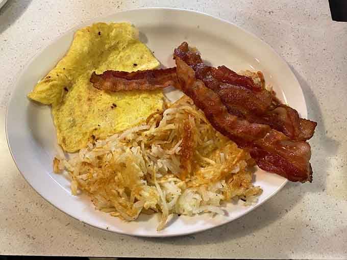 Golden hash browns, crispy bacon, and perfectly cooked eggs prove that some classics never need improvement.