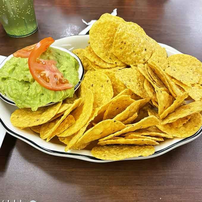 Fresh guacamole and crispy tortilla chips prove that sometimes the simplest appetizers are the most dangerously addictive.
