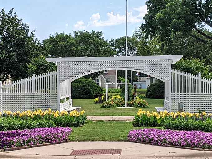 Lincoln Park's white arbor and flower beds prove small towns can do landscaping that rivals any city park.