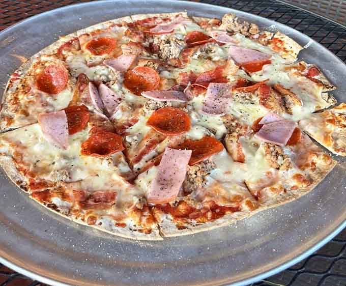 Meat lovers pizza that takes the concept seriously, like really seriously, no vegetables allowed here.