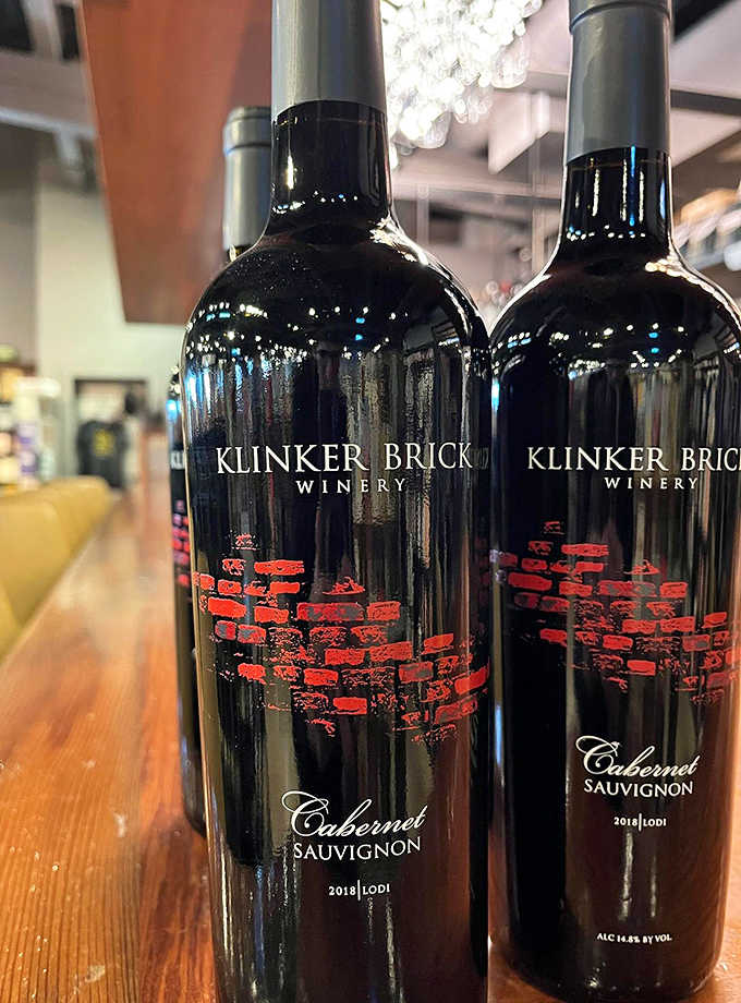 Klinker Brick Cabernet Sauvignon bottles standing ready to make your evening significantly more interesting than it was.
