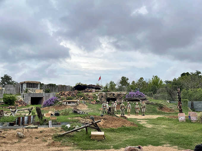 Recreated Pacific battlefields bring history to life where mannequin soldiers stand eternal guard under Texas skies.
