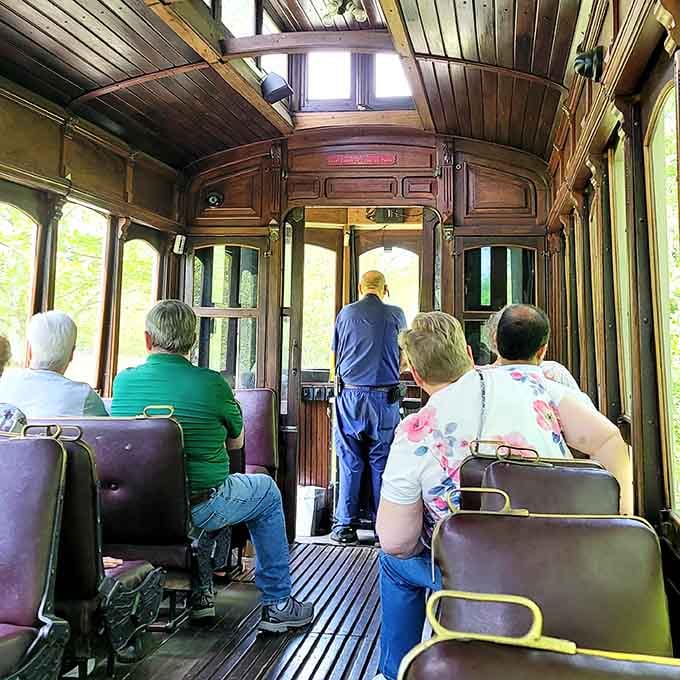 Inside these vintage passenger cars, the wood paneling and period details transport you faster than the actual locomotive does.