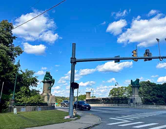 Even the traffic lights seem impressed by their copper neighbors towering overhead with such confidence.