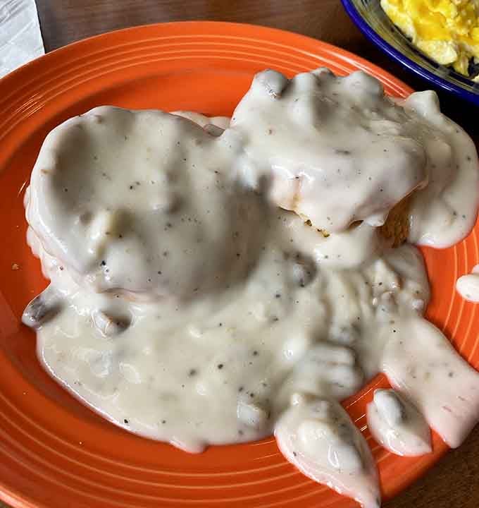 Biscuits drowning in gravy like this should probably come with a warning label and maybe a cardiologist's phone number.