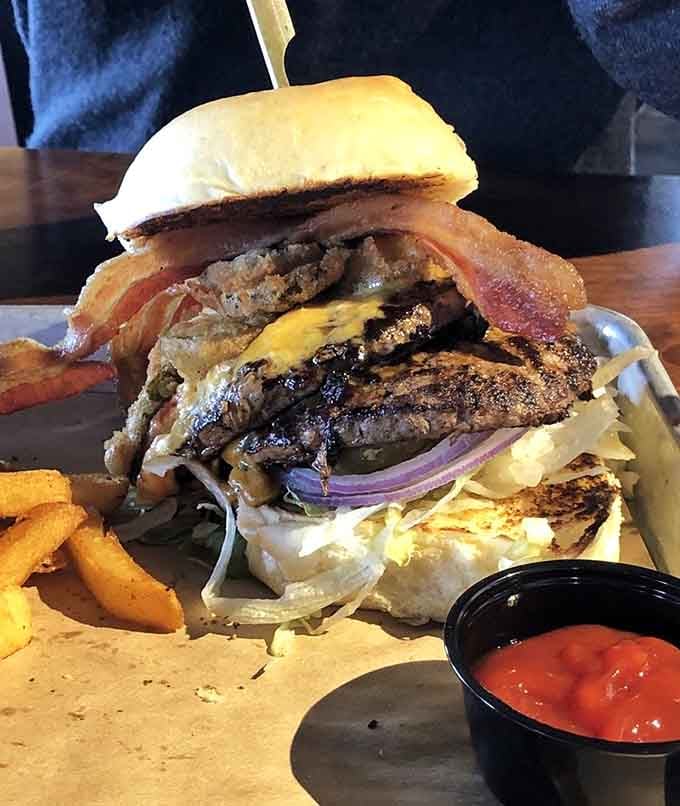 The Goodwood burger stacked high with bacon and all the fixings proves more is definitely more sometimes.