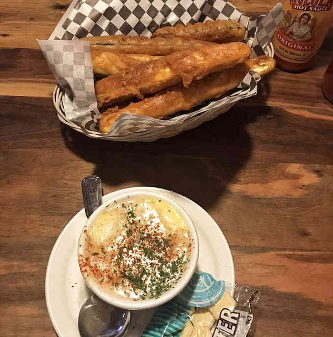 Golden-fried zucchini sticks meet their creamy, clam-studded soulmate in this perfect coastal pairing.