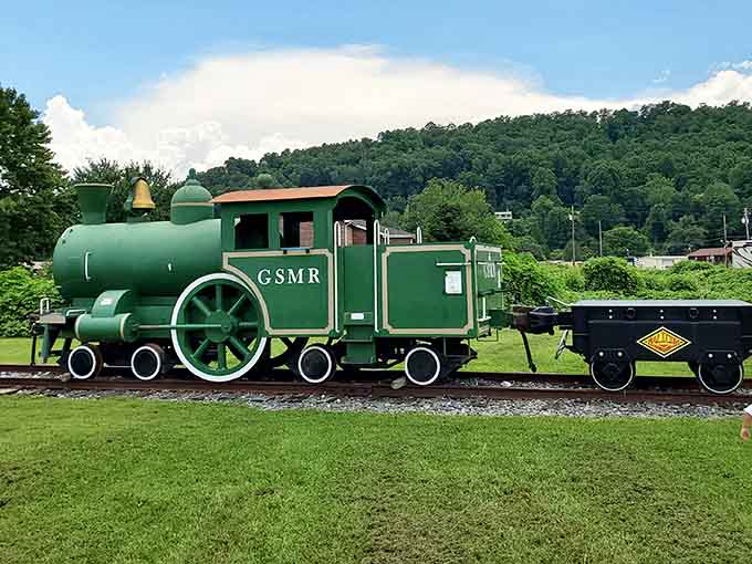 This cheerful green engine looks like it rolled straight out of a children's storybook, bell and all.