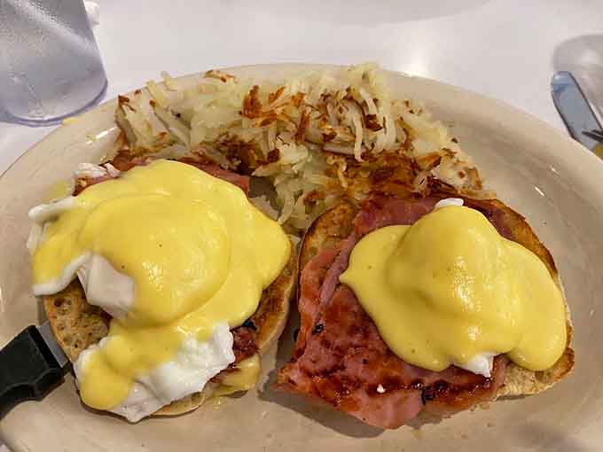 Eggs Benedict done properly, with hollandaise that would make brunch enthusiasts weep tears of joy and gratitude.