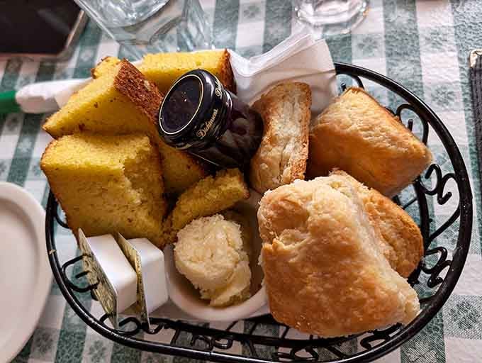 Fluffy biscuits and golden cornbread arrive like edible sunshine, ready to soak up every last drop of deliciousness.