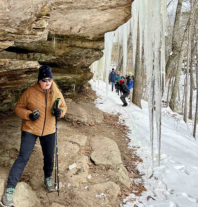 Winter hiking reveals dramatic ice curtains that transform the canyon into something straight out of a fantasy novel.