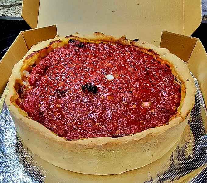Golden perfection in a box, this deep dish could make a grown pizza lover actually weep.