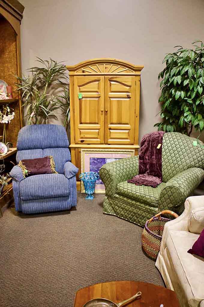 That blue recliner and pine armoire combo screams "comfortable retirement living" at prices that won't touch your retirement fund.
