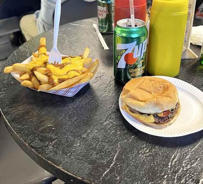 A cheeseburger and fries combo that proves sometimes the simplest meals are the most satisfying ones around.