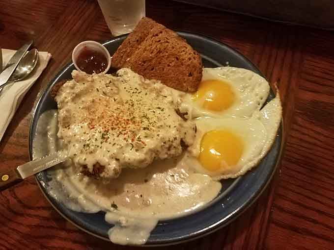 Chicken fried steak smothered in gravy with eggs that could make a grown person weep with joy.