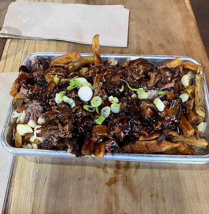 Brisket poutine proves that sometimes the best ideas come from throwing culinary rules out the window entirely.