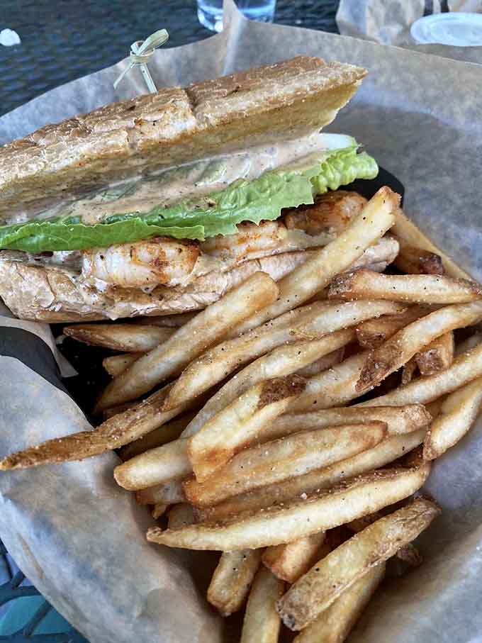 That grilled chicken sandwich with perfectly seasoned fries looks like it could solve most of life's problems, honestly.