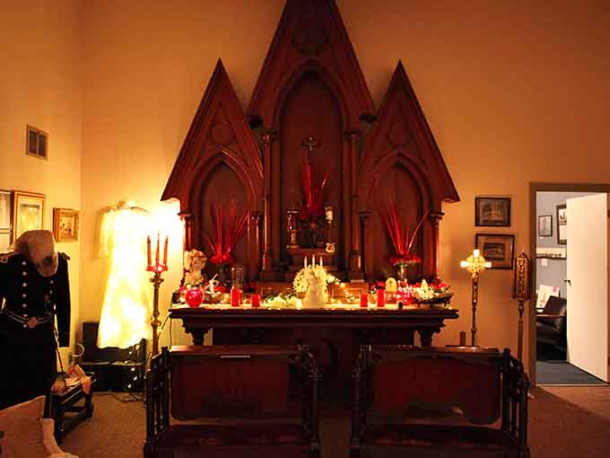 The ornate wooden altar remains, a stunning reminder of the building's sacred beginnings before its mortuary transformation.