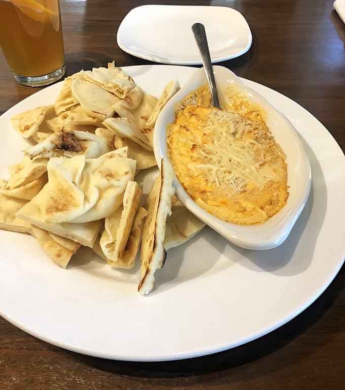 That baked shrimp dip with warm pita triangles is basically a hug in appetizer form for your taste buds.