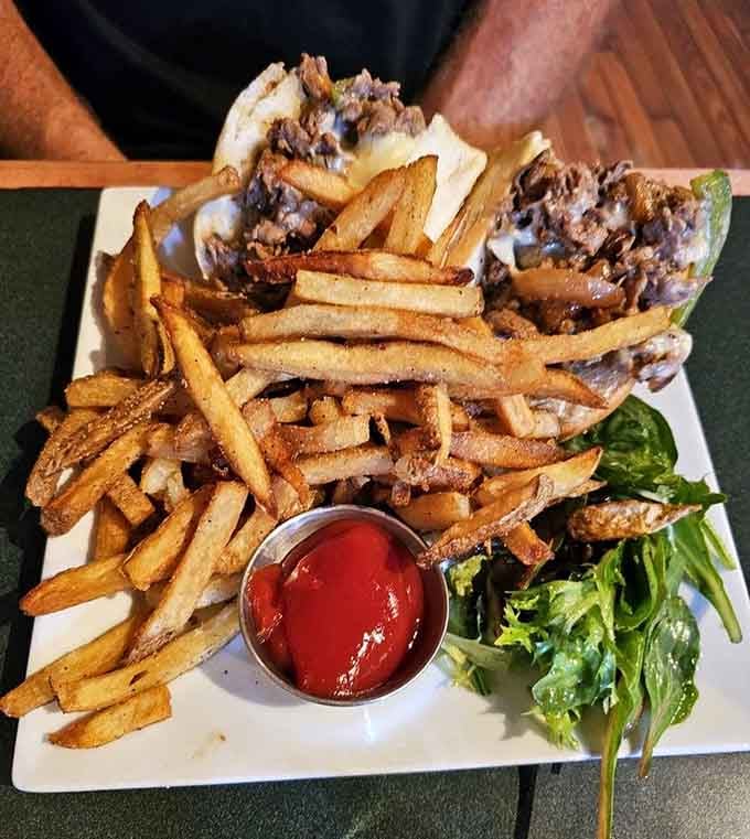 That Philly cheesesteak comes loaded with enough fries to share, though you probably won't want to at all.