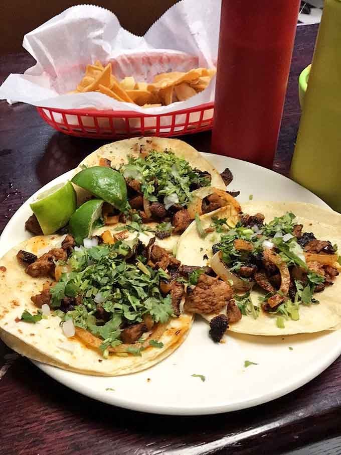 Al pastor tacos with charred edges and fresh cilantro are what taco dreams are made of, period.