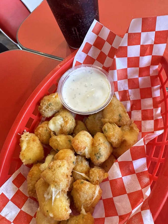 Golden, crispy cheese curds with ranch dressing, Wisconsin's gift to humanity and your taste buds' new best friend.