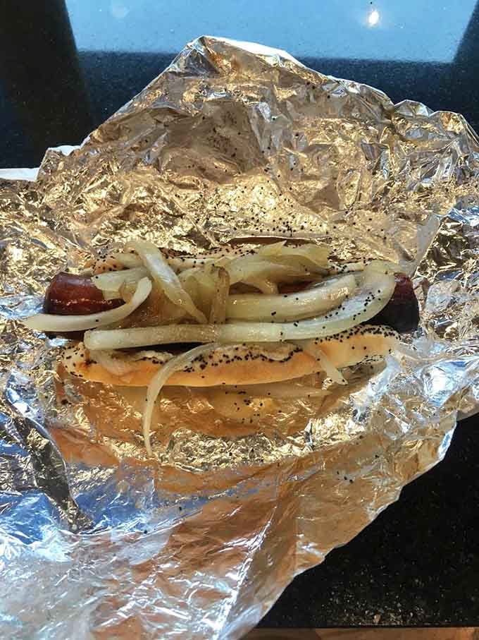 The Maxwell Street Polish with grilled onions is what happens when Chicago history meets your hungry stomach perfectly.