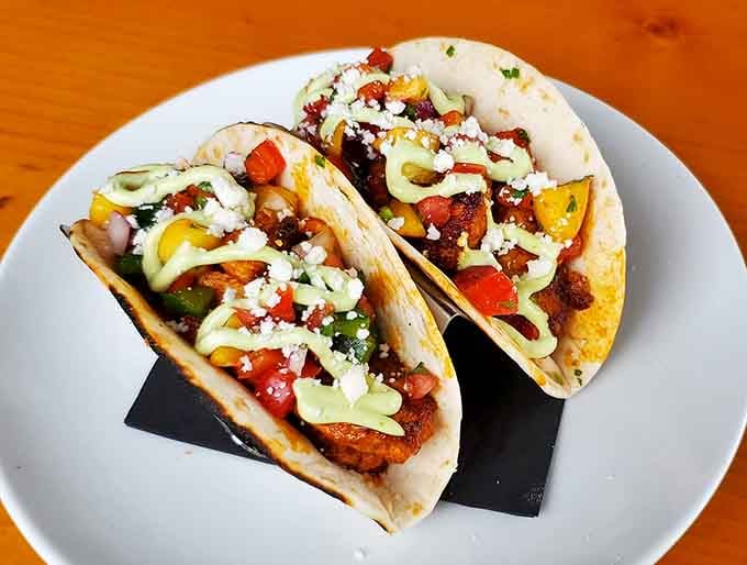 Tacos dressed up with crumbled cheese and fresh toppings that'll make you rethink everything about casual dining.
