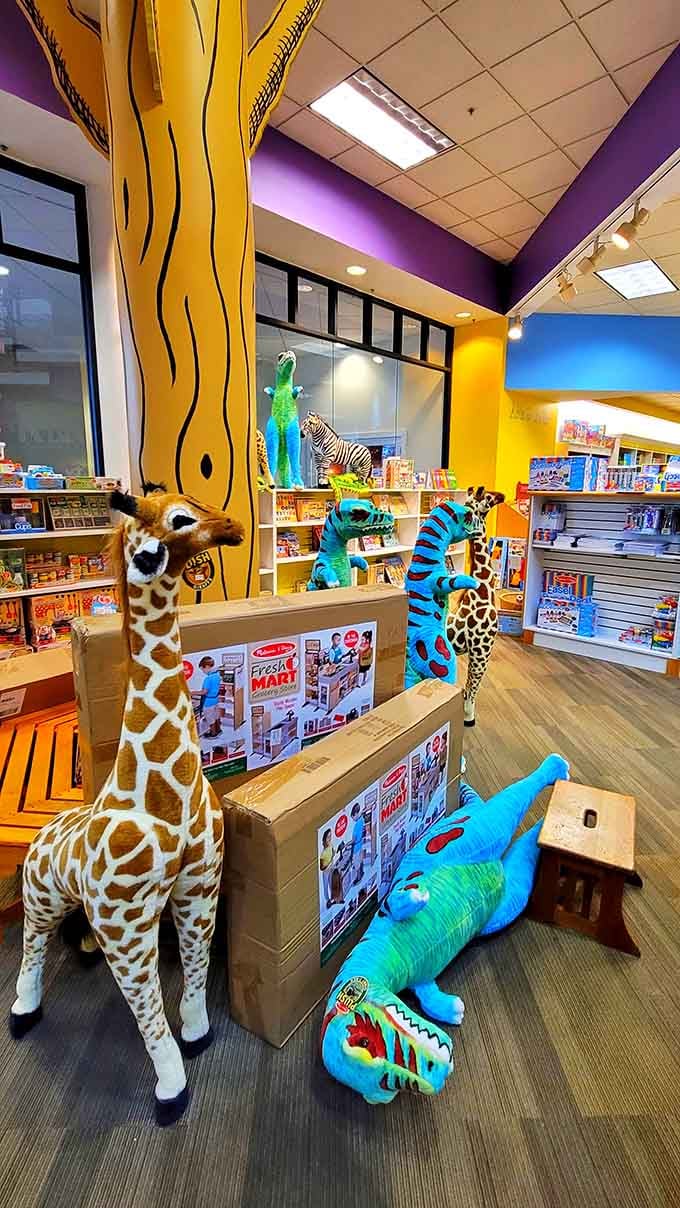 The children's section where giraffes and dinosaurs guard the gateway to young imaginations, because reading should be an adventure.