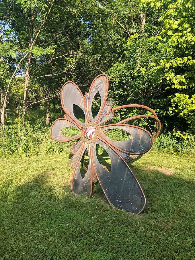 This oversized metal flower blooms eternally, proving that gardens don't always need water to flourish beautifully.