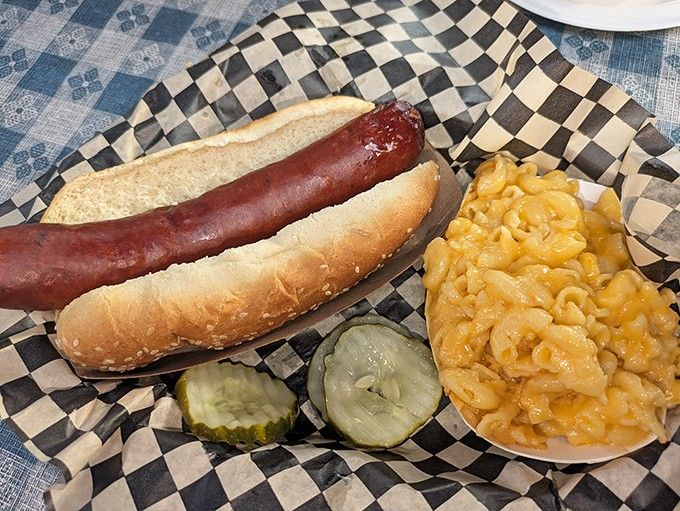 That hot link looks ready to steal the show, nestled perfectly with mac and cheese as backup.