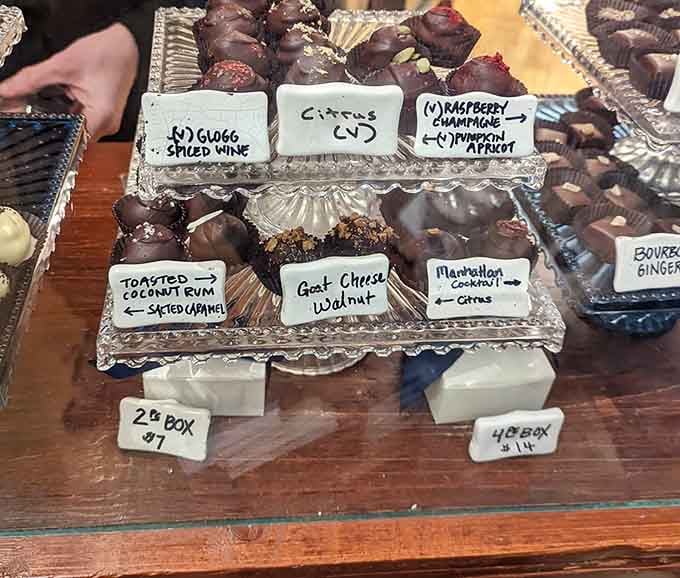 Handcrafted chocolates lined up like little soldiers of joy, each one ready to make your day infinitely better.