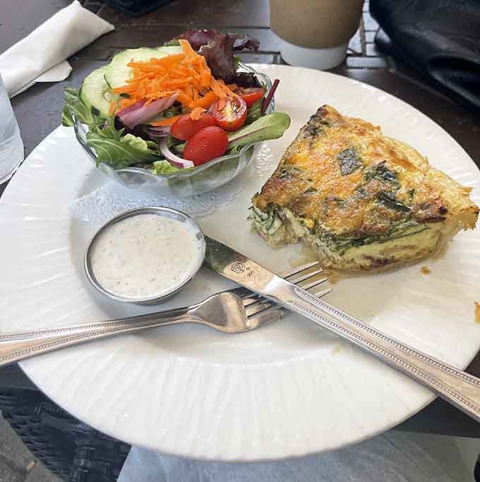 That quiche sits there looking all sophisticated with its fresh salad sidekick, proving healthy can be heavenly.