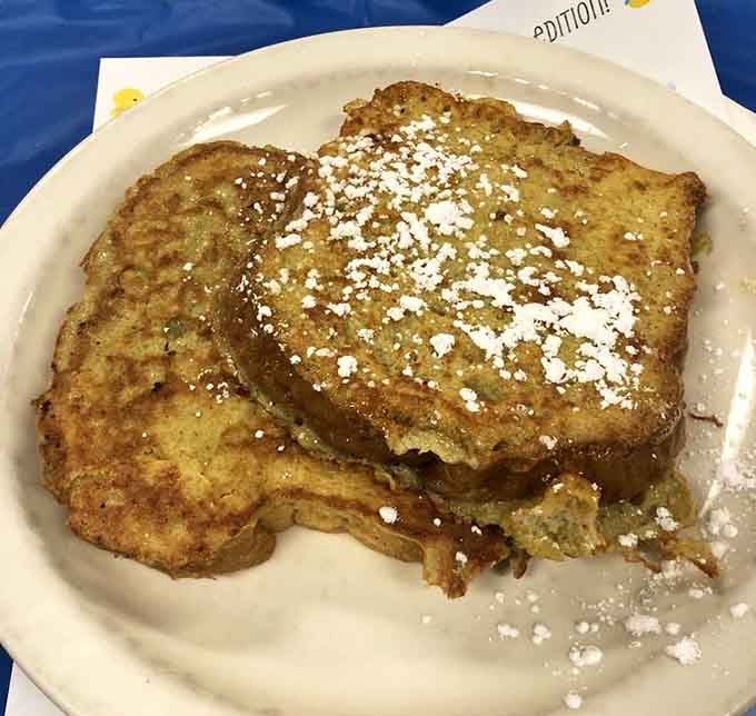 Golden, crispy French toast dusted with powdered sugar&mdash;breakfast doesn't get more picture-perfect than this moment.