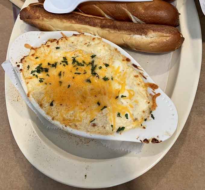 Hot crab dip with bread that's basically asking you to abandon all dietary plans and live your best life.