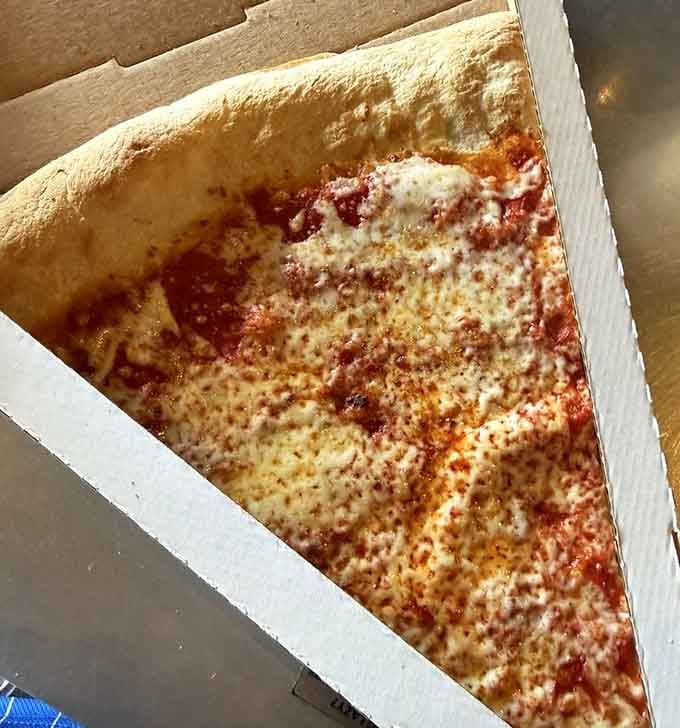 A simple cheese slice that's bigger than most people's dinner plates &ndash; simplicity never looked so intimidating.