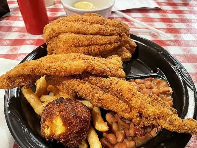 Golden fried catfish piled high with hushpuppies and beans&mdash;this is what Thursday night dreams are made of, folks.